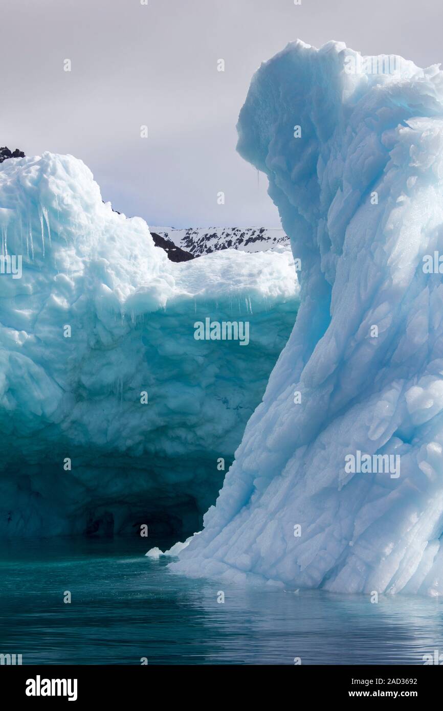 Iceberg cave. View of a cave formed in a large iceberg. Photographed in ...