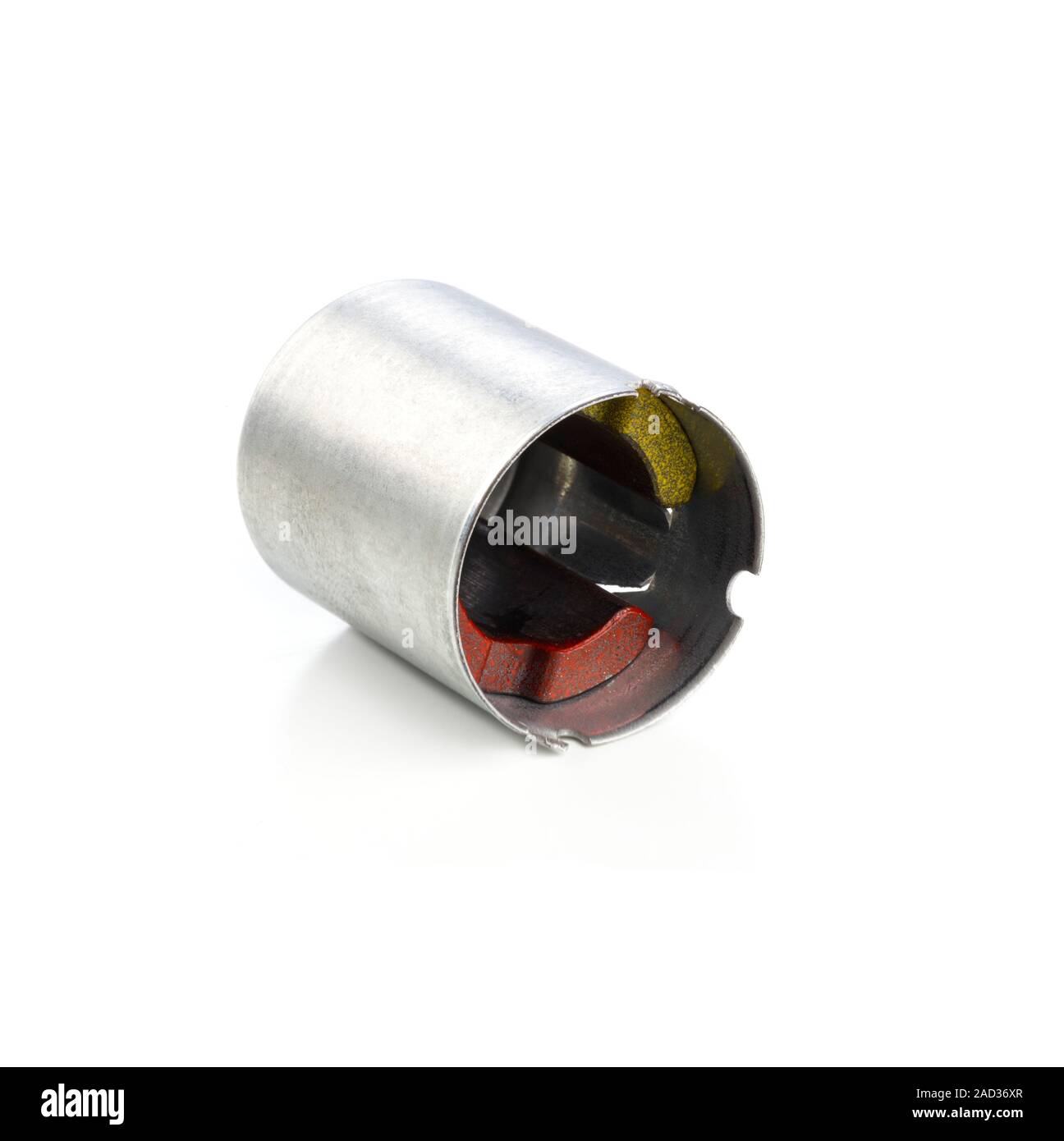 Disassembled DC (direct current) motor shell. Inside the shell are the ...