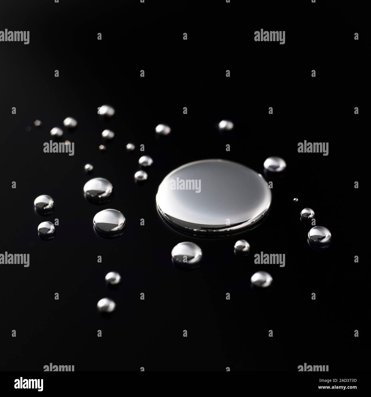 Drops of mercury. Mercury is a heavy, silvery metal that is liquid at ...