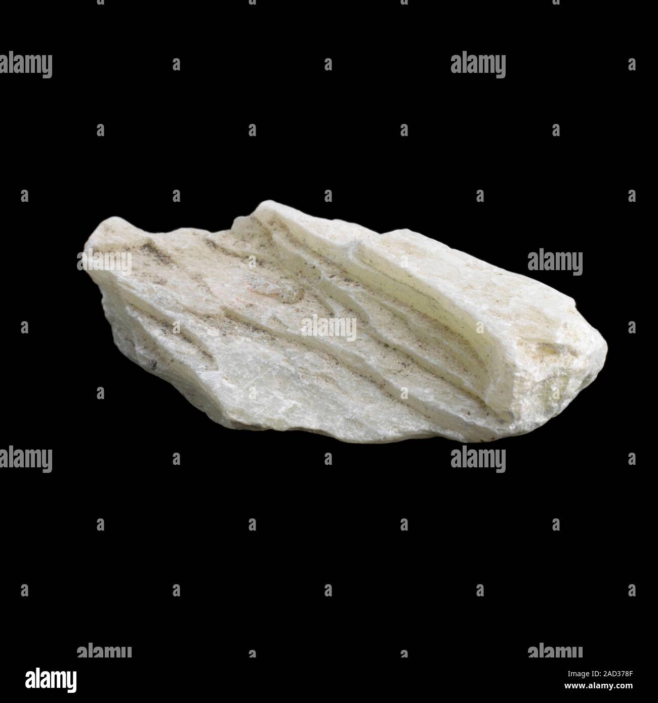 Sample of talc. Talc is a hydrated magnesium silicate, formed by ...