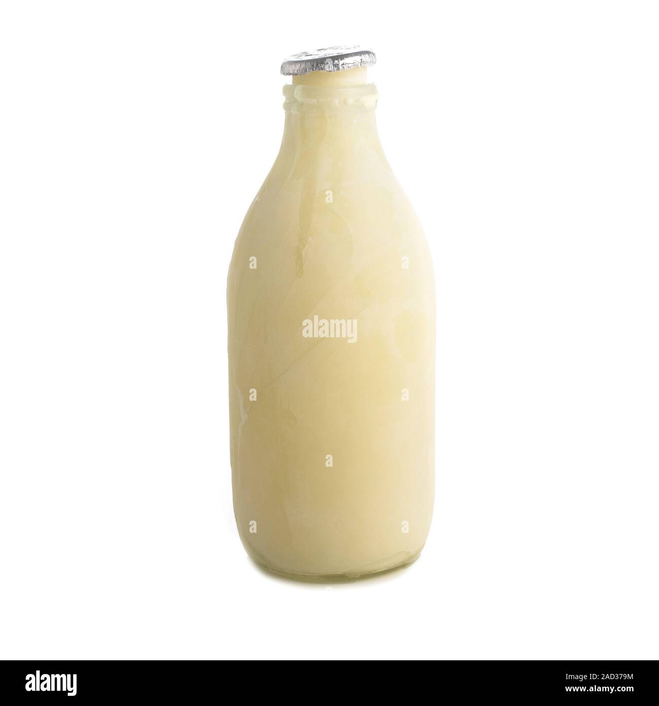 Frozen bottle of milk, showing how water (milk's main constituent ...