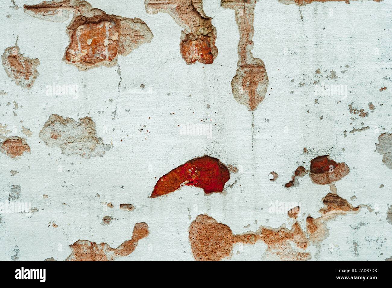 the texture of an old brick wall peeling plaster Stock Photo - Alamy