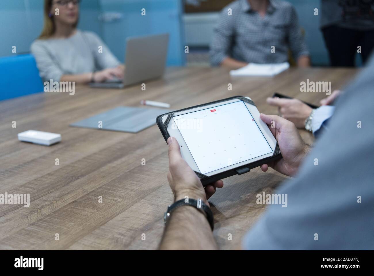Financial team using digital tablet hi-res stock photography and images ...