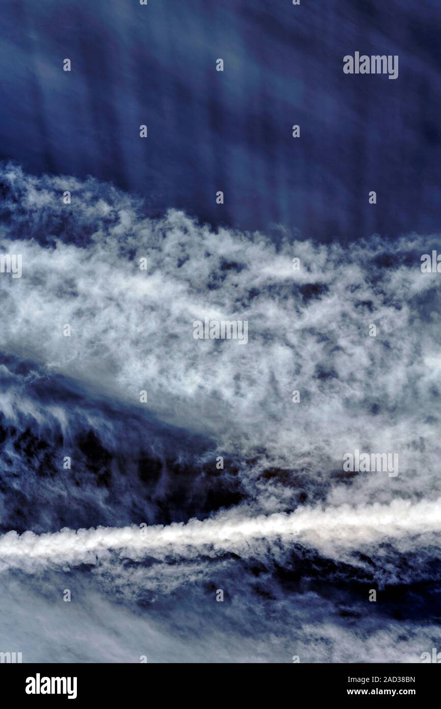 Cirrus clouds and contrails. Vertical panorama of high cirrus clouds in ...