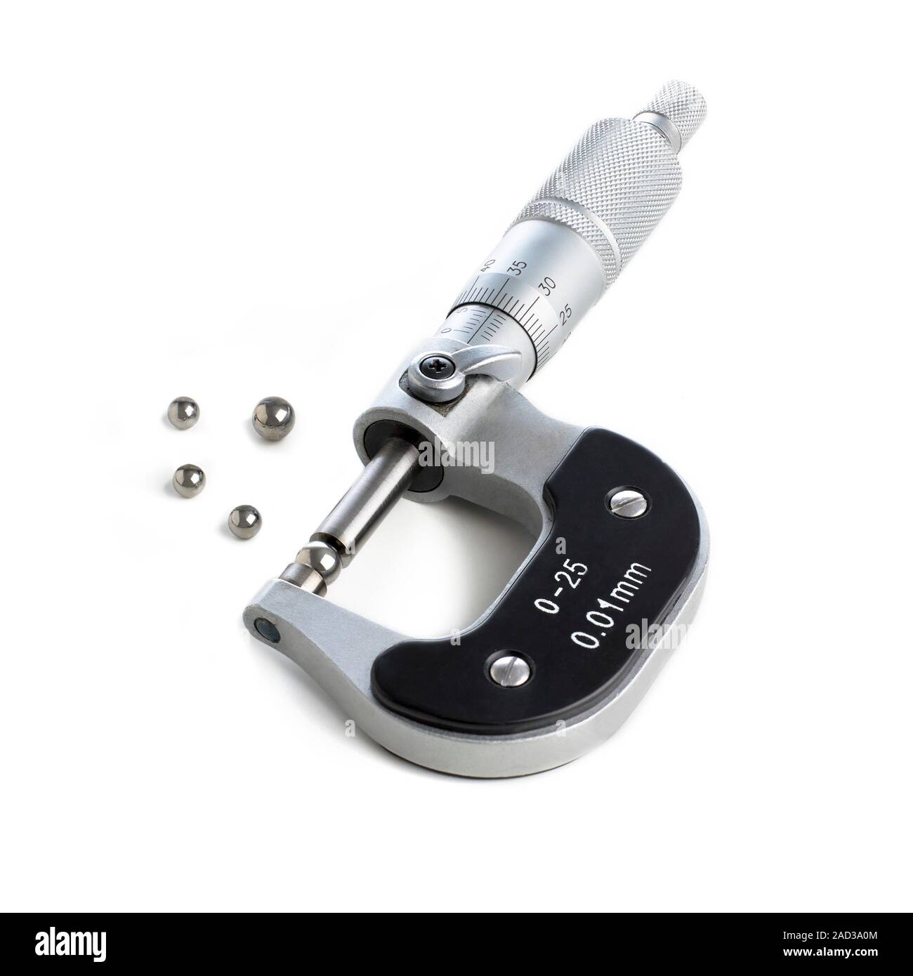 Micrometer measuring a ball bearing. Micrometre screw gauges are used ...