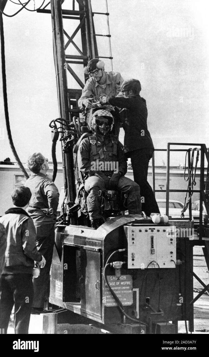 Aircraft ejection seat test. Trainee taking part in the 1960s in a ...