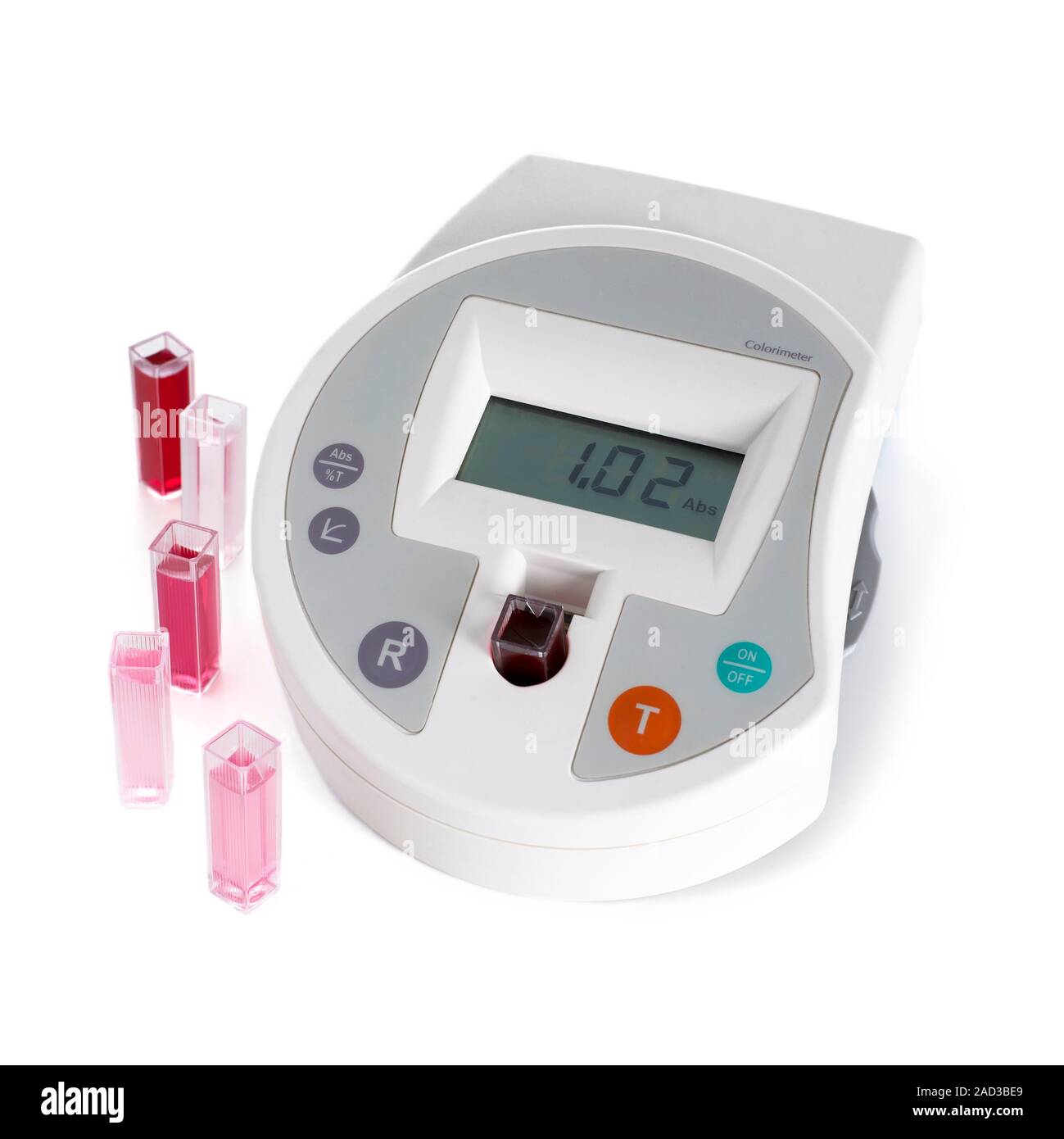 Digital colorimeter measuring a sample, with several sample cuvettes ...