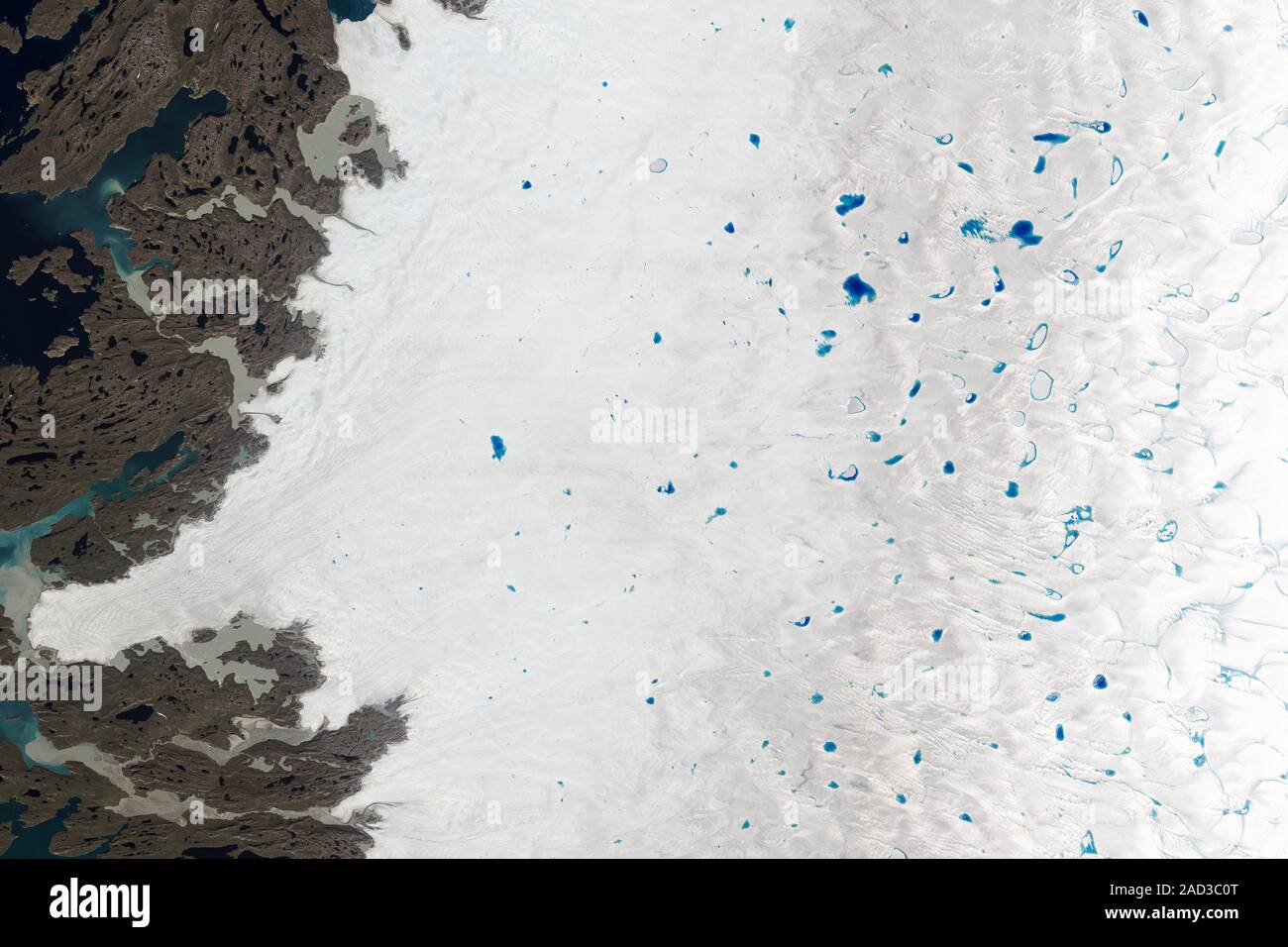 Meltwater lakes in Greenland. Satellite image of pools of meltwater ...