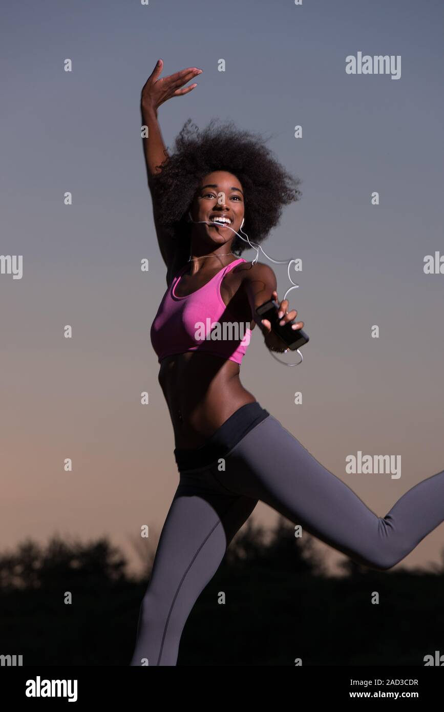 black woman is doing stretching exercise relaxing and warm up Stock ...