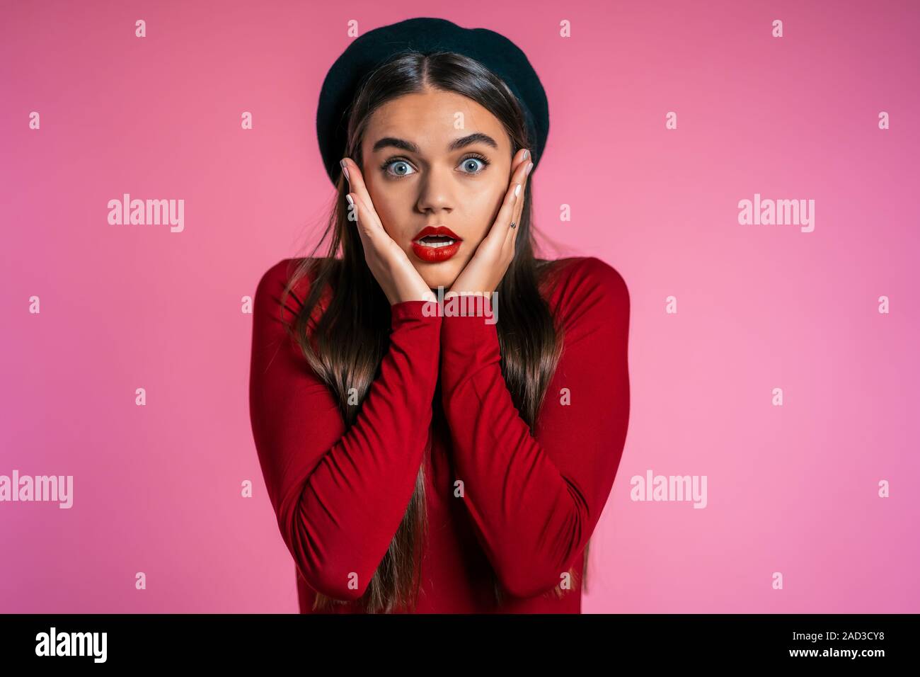Portrait of cute girl shocked. Pretty woman with perfect make-up ...