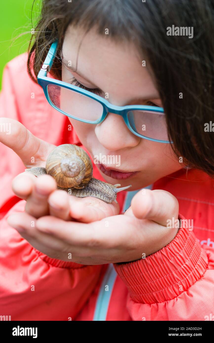 Girl snail hi-res stock photography and images - Alamy