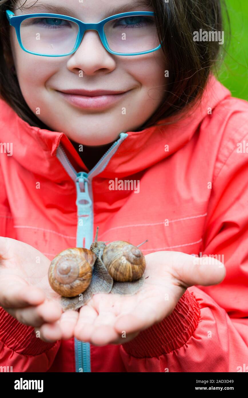 Girl snail hi-res stock photography and images - Alamy