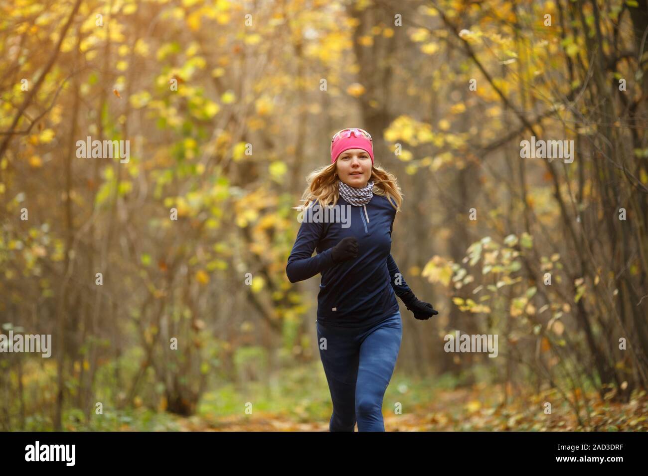 Running autumn hi-res stock photography and images - Alamy