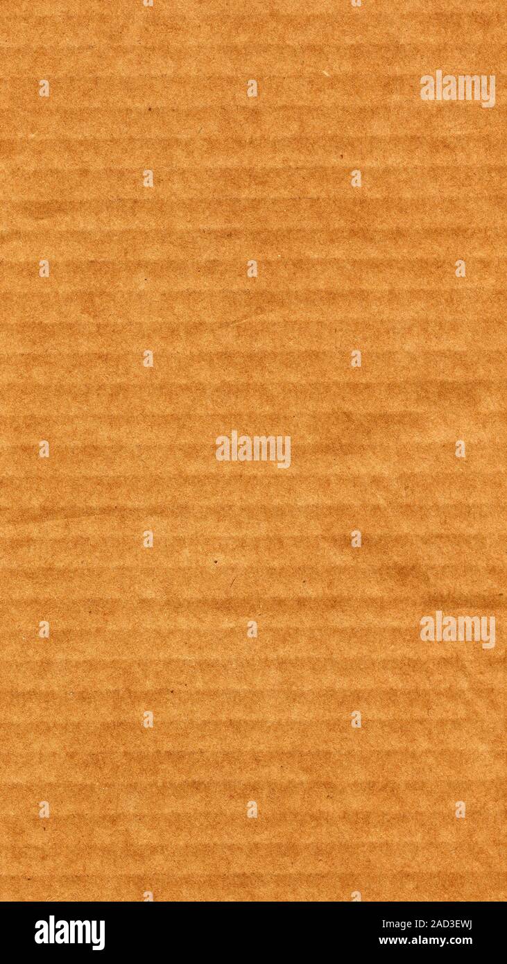 Brown corrugated cardboard background - vertical Stock Photo - Alamy