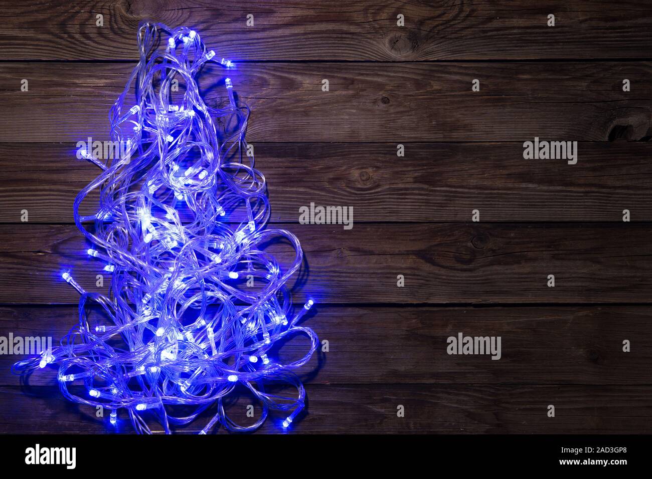 Christmas festoon shining blue color Stock Photo - Alamy