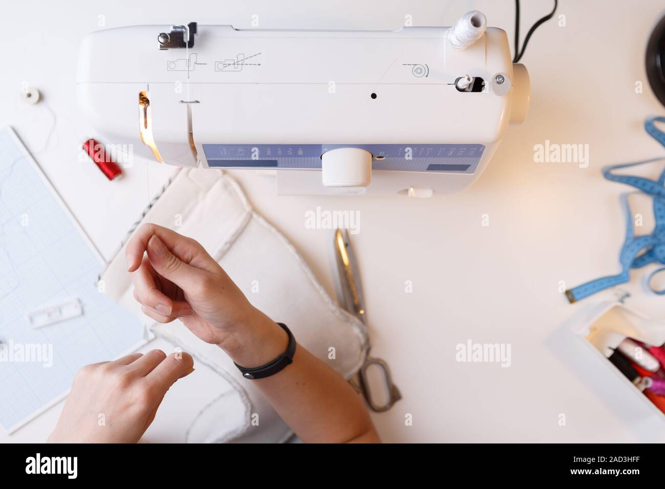 Dressmaker with sewing-machine top view Stock Photo - Alamy