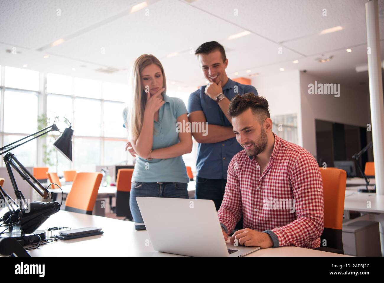 Group of young people employee workers with computer Stock Photo - Alamy