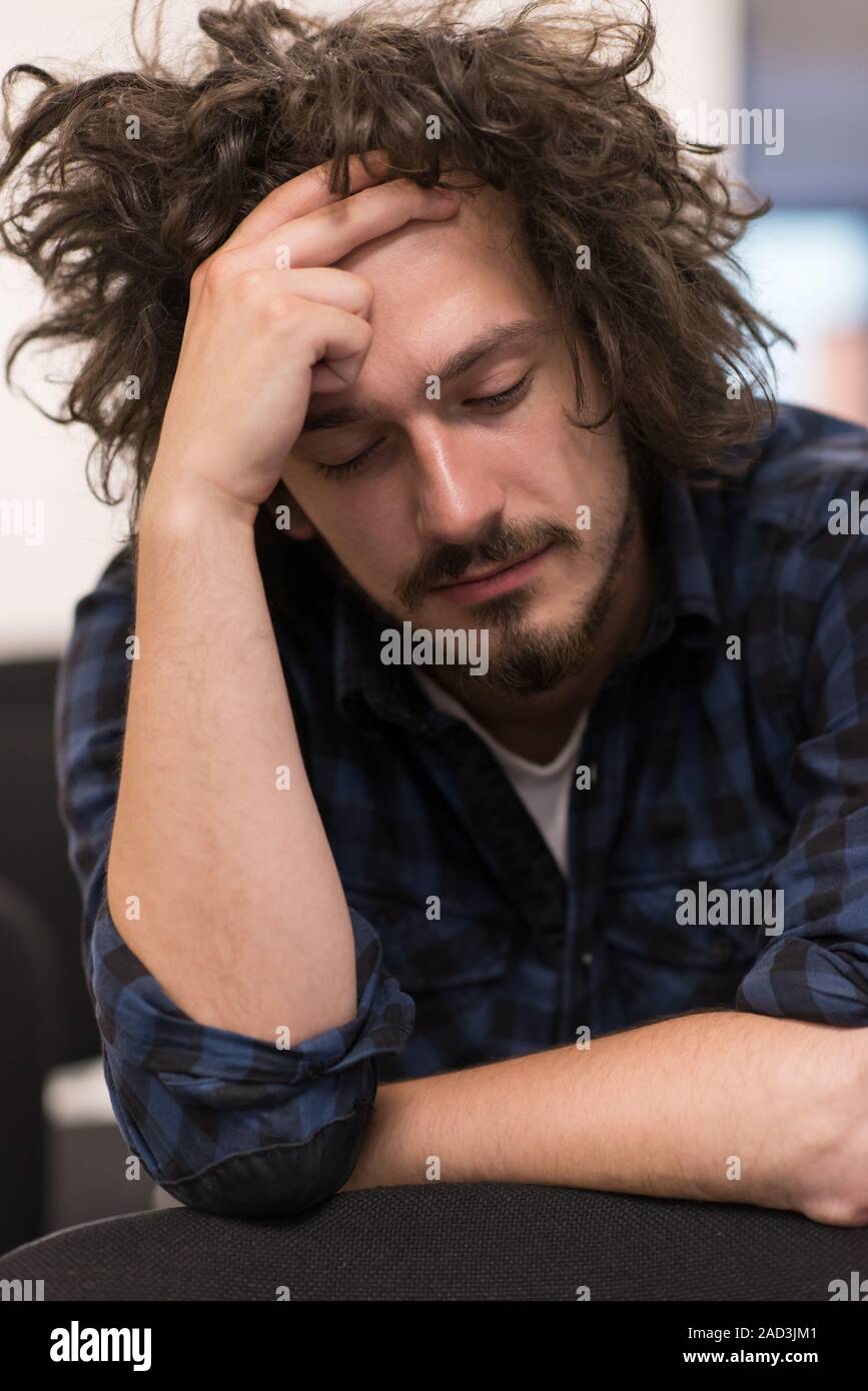 A student sits alone in a classroom Stock Photo - Alamy