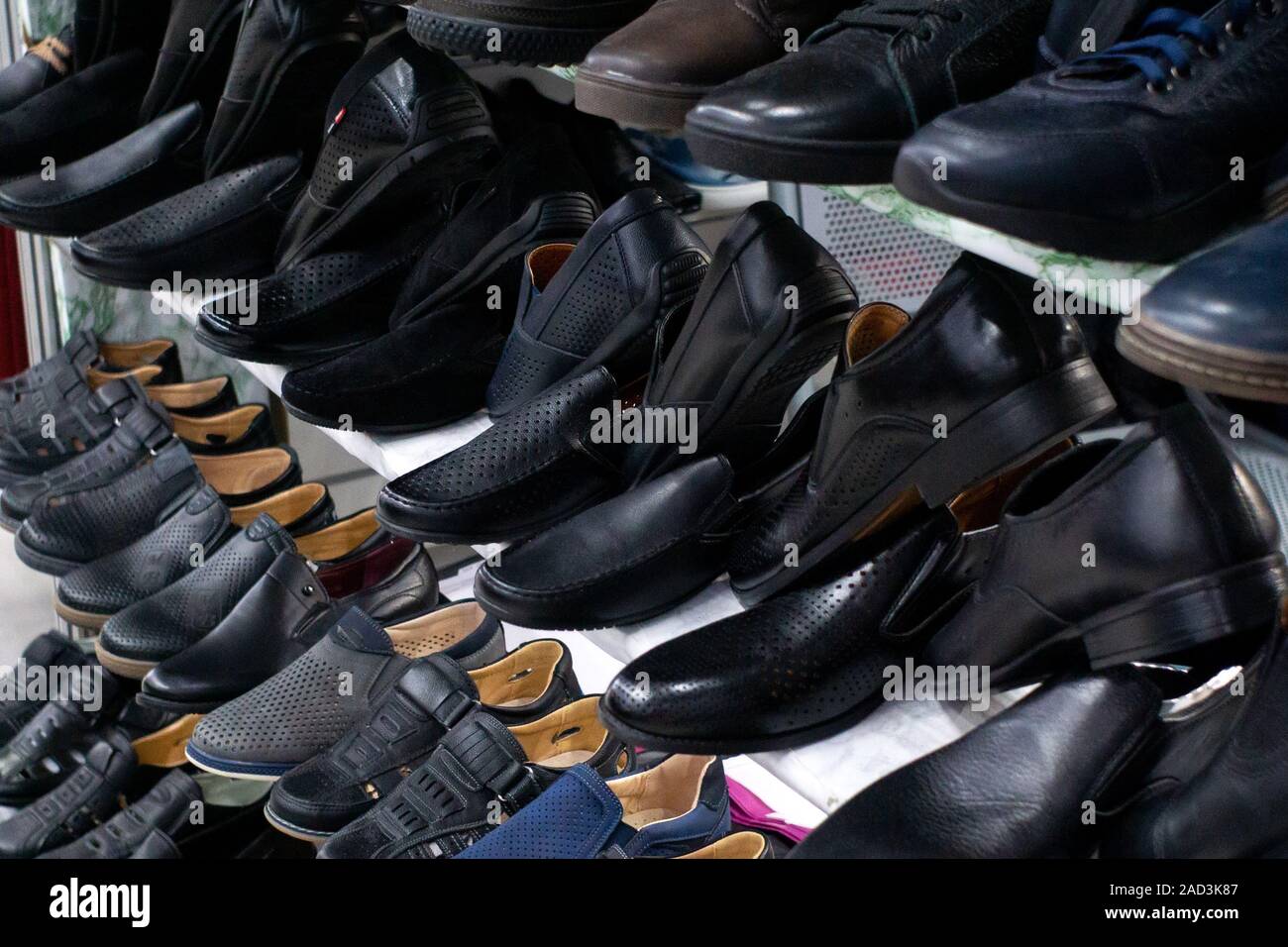 black men's leather shoes on the store counter a large selection ...