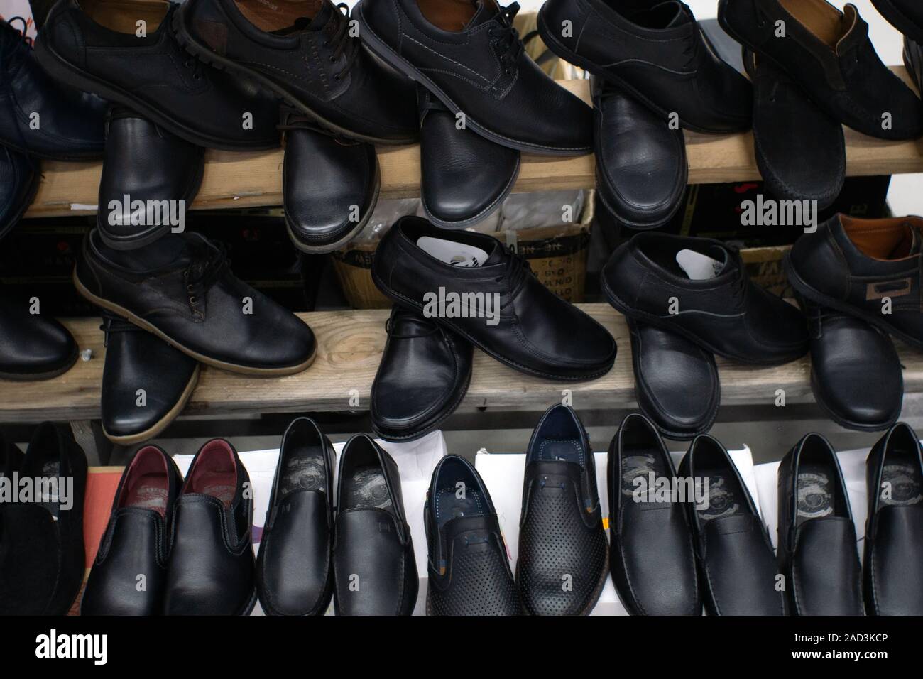 black men's leather shoes on the store counter large selection Stock ...