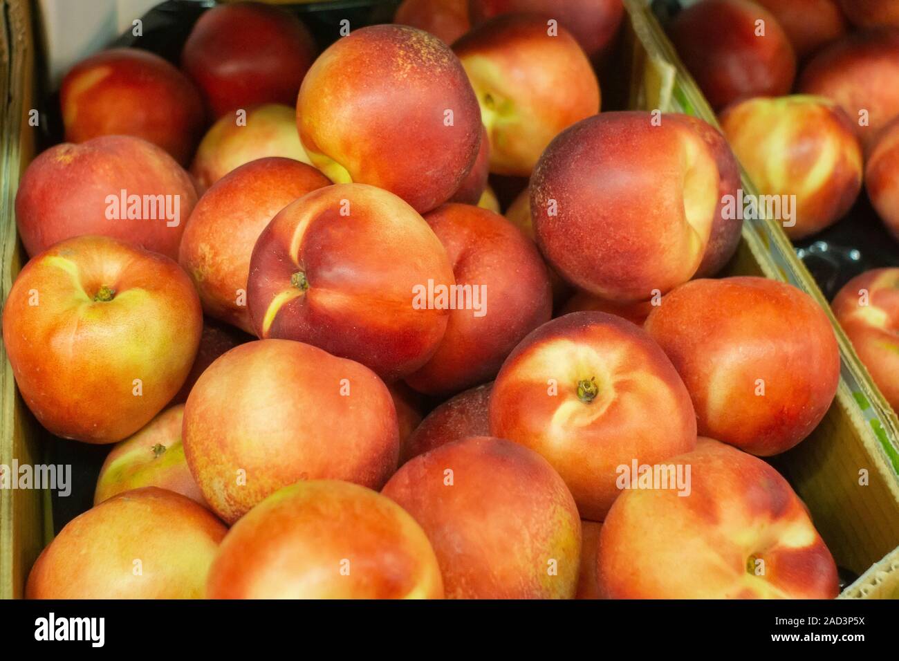 nectarines background texture closeup on the counter at the convenience ...