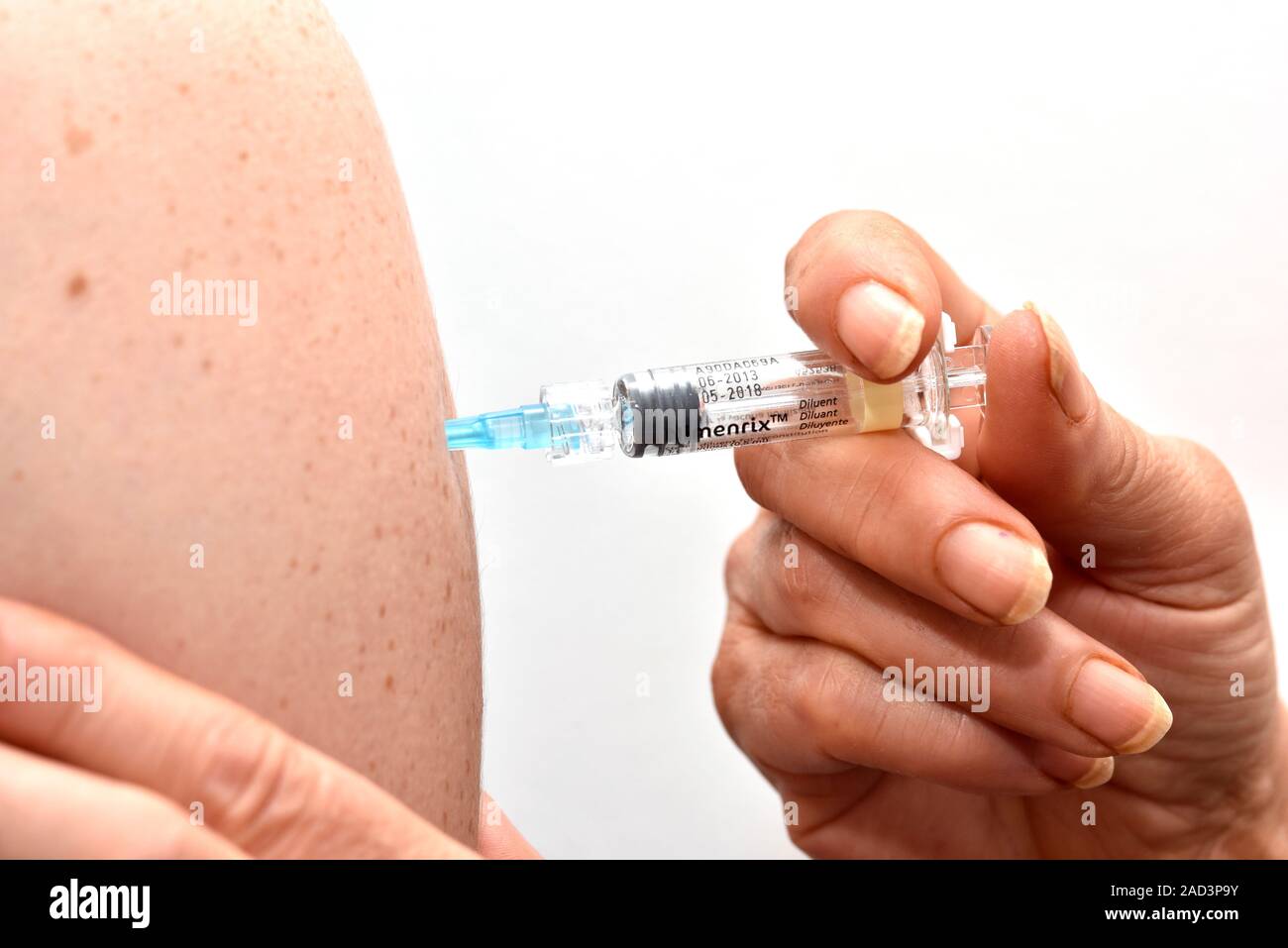 Meningitis vaccine. Person receiving an injection of Nimenrix vaccine ...