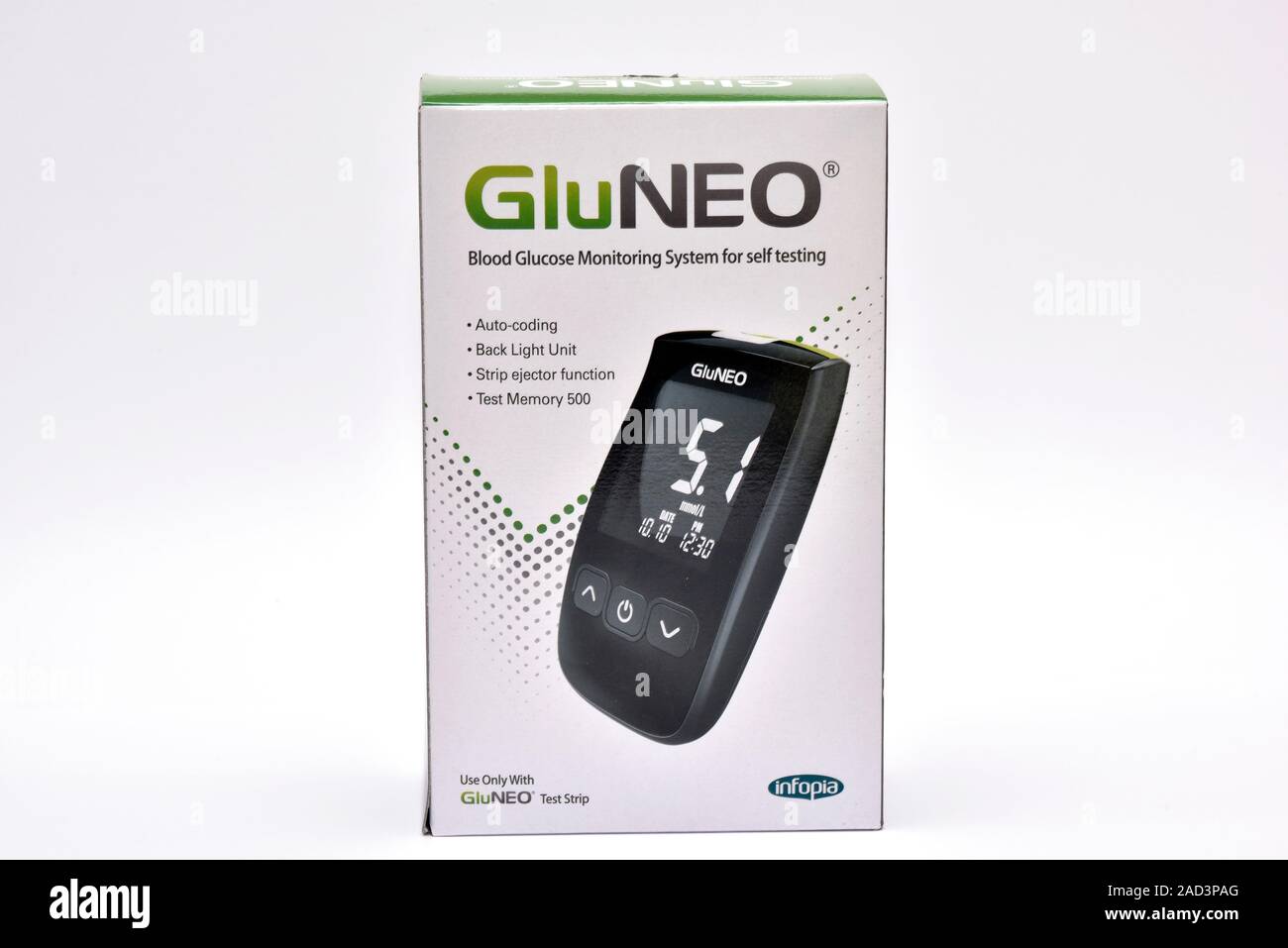 Blood glucose monitor. Box containing a digital monitor (glucometer ...