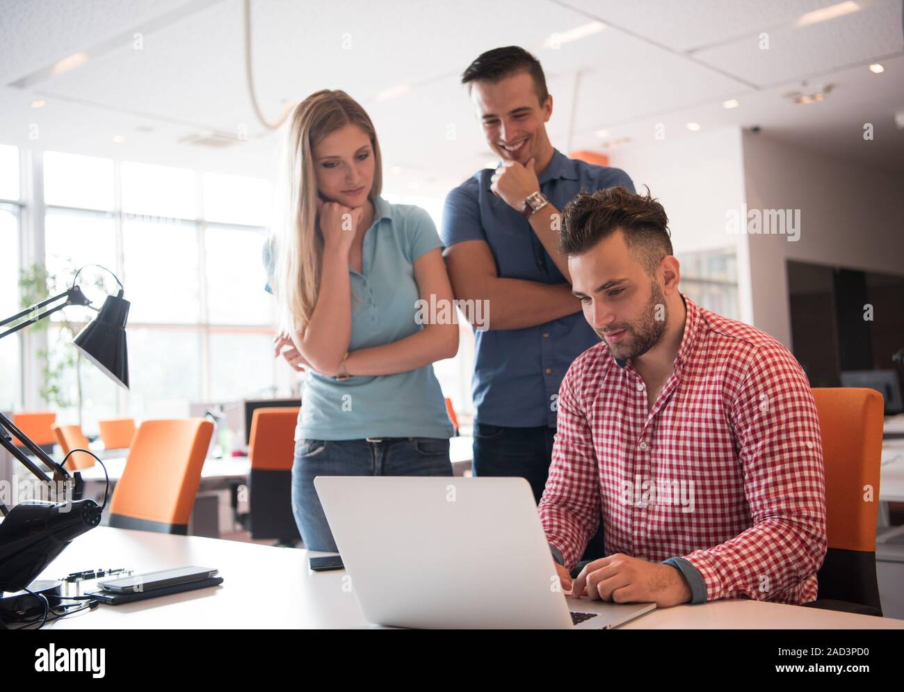 Group of young people employee workers with computer Stock Photo - Alamy
