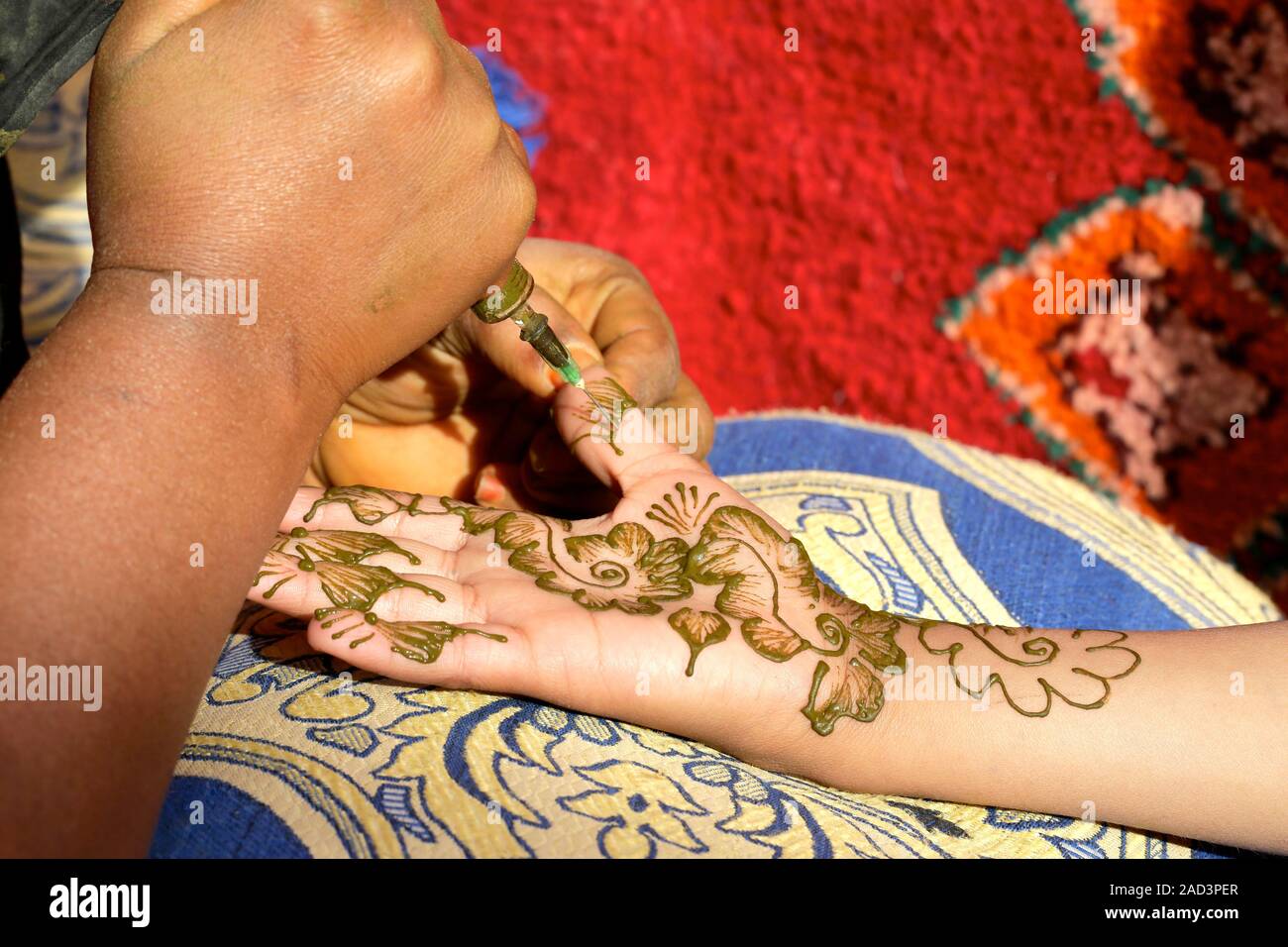 Henna tattoo. Henna tattoos are created by the temporary staining of ...