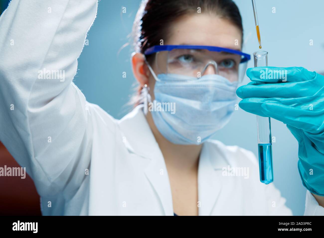 Laboratory technician with test tube Stock Photo - Alamy