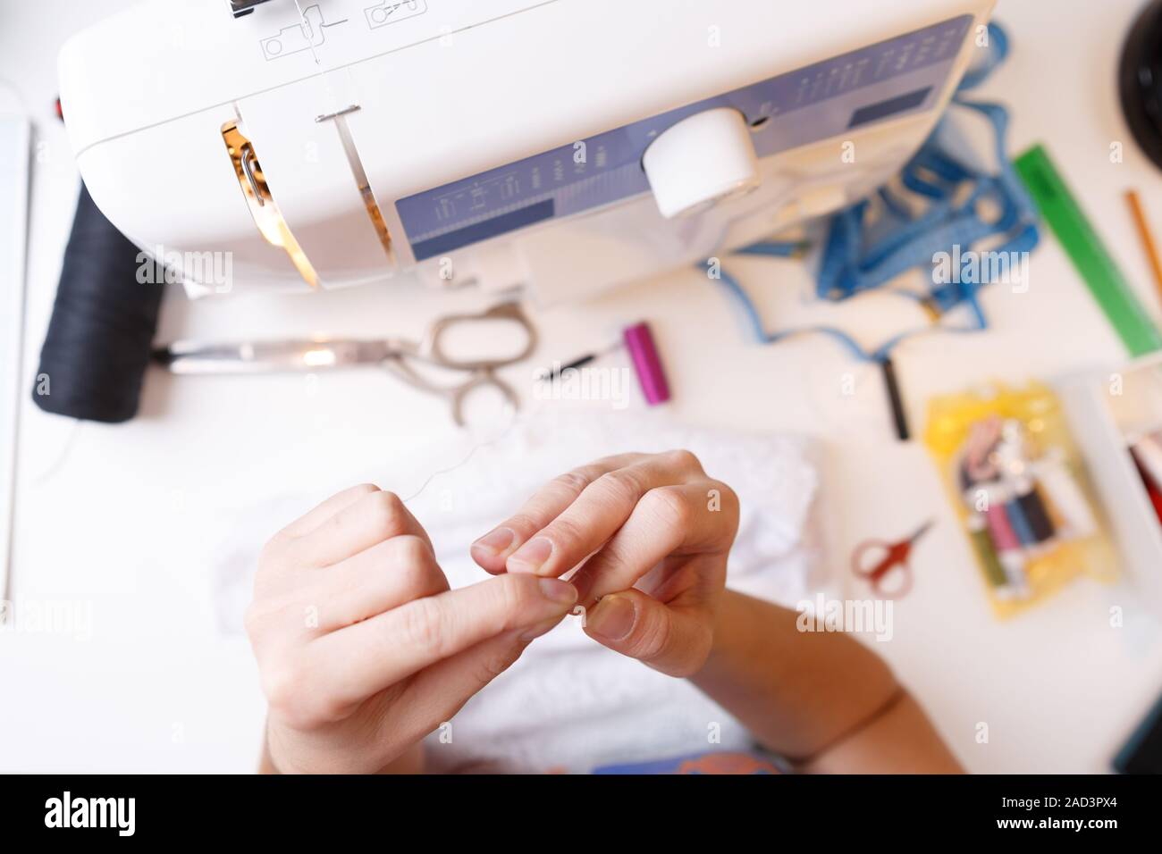 Girls sewing hi-res stock photography and images - Alamy