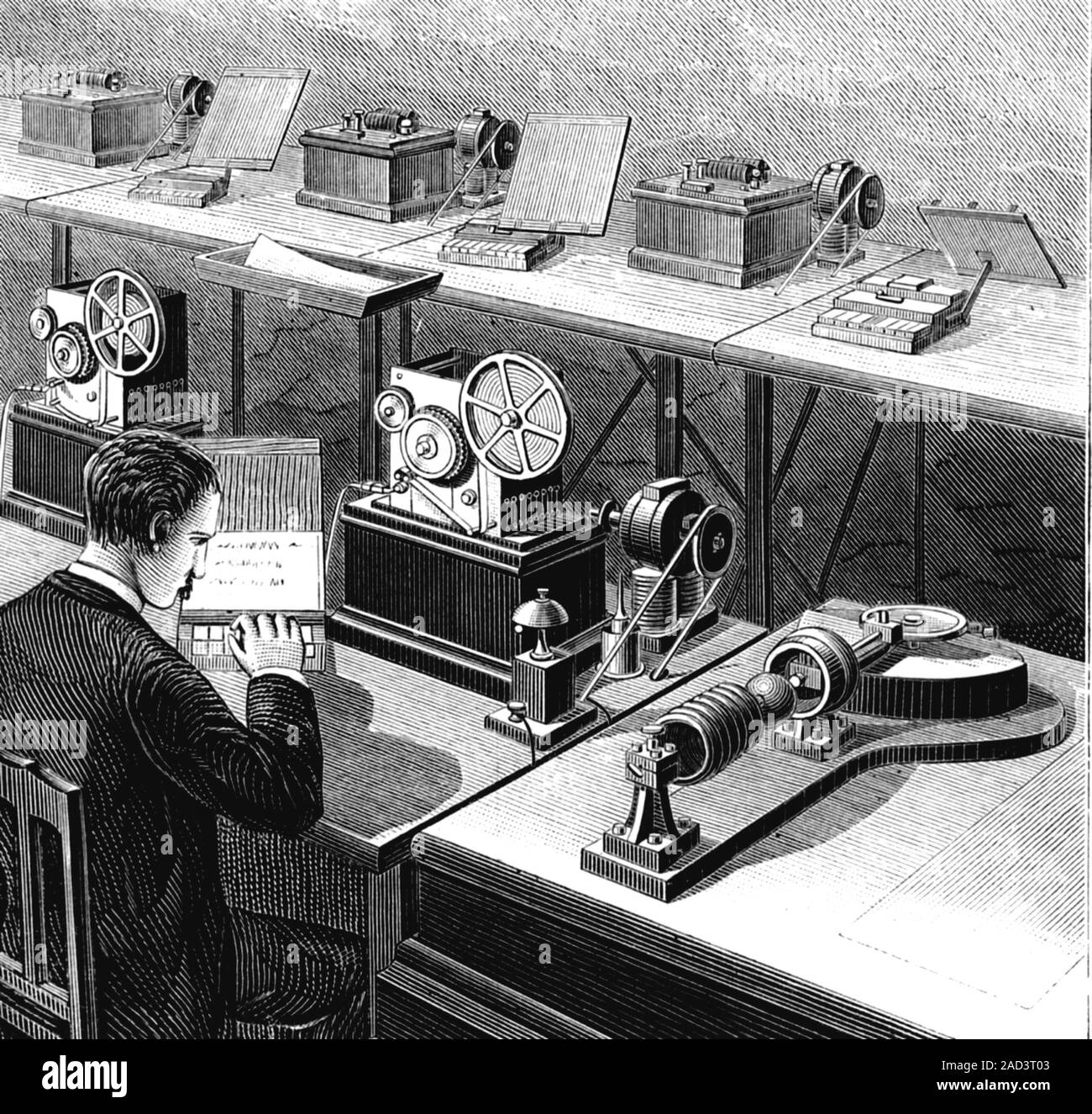 Baudot telegraph system. 1888 illustration of an operator using a ...