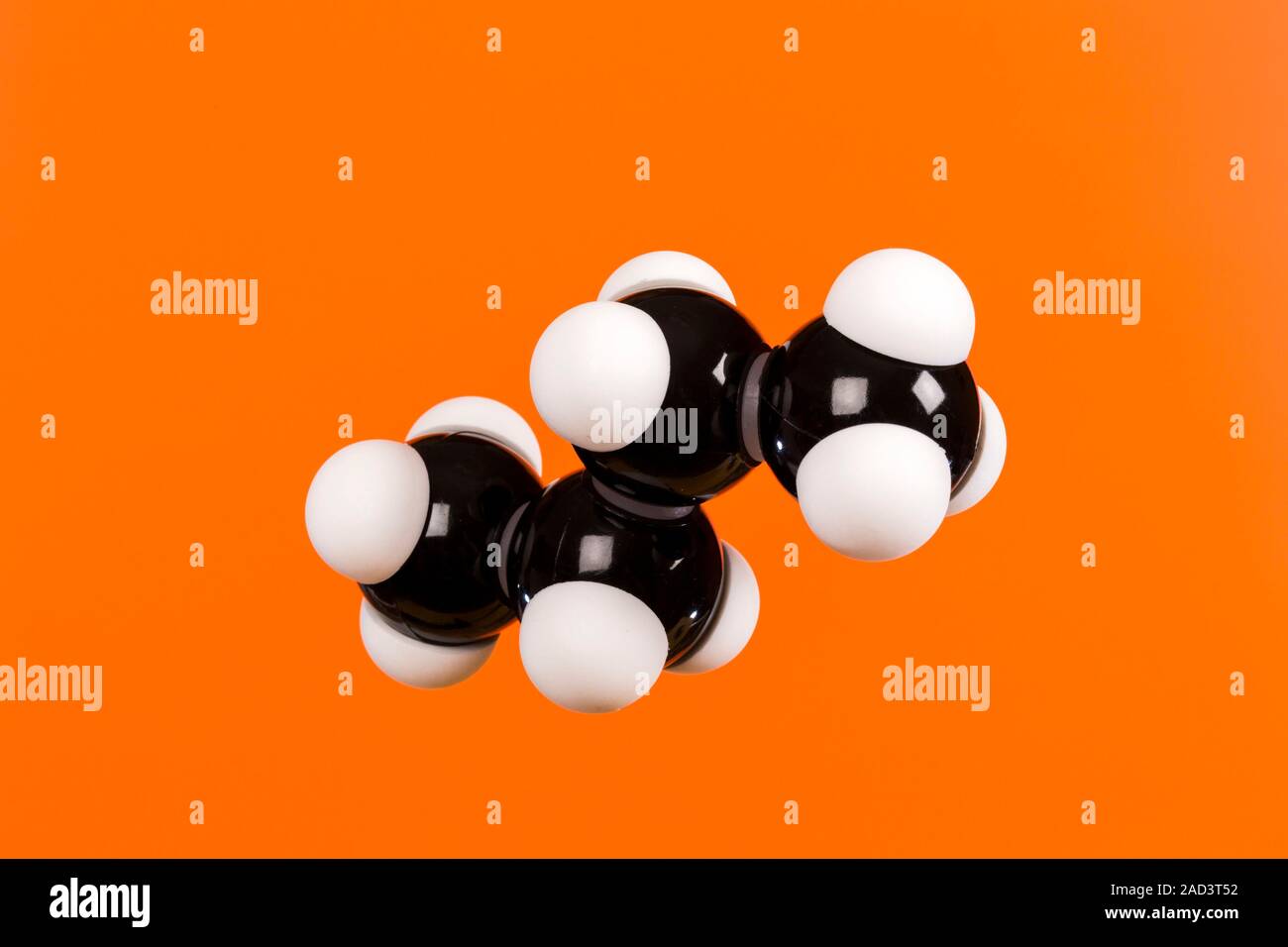 Semi space-filling model of a butane molecule. Atoms are represented as ...
