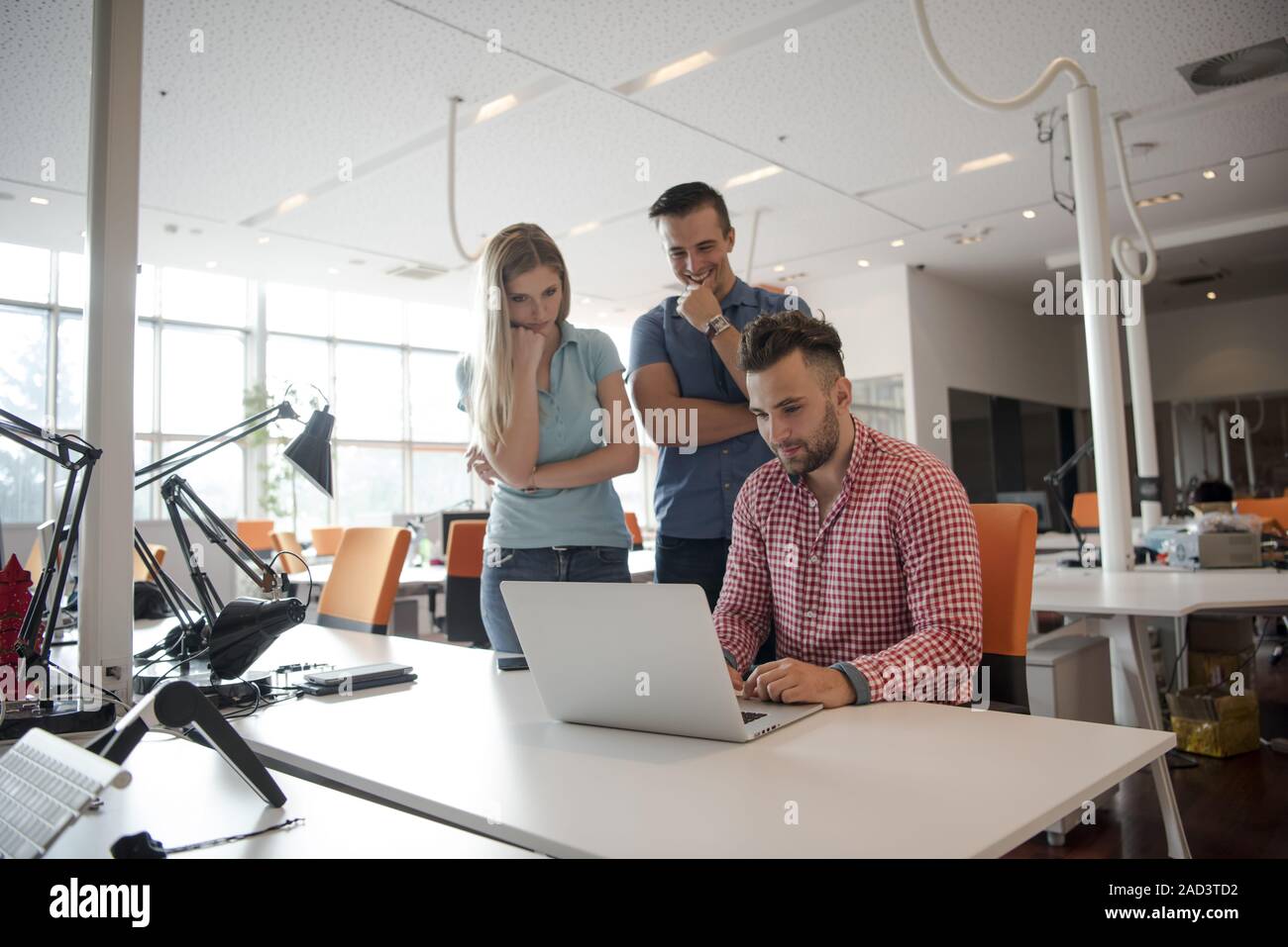 Group of young people employee workers with computer Stock Photo - Alamy