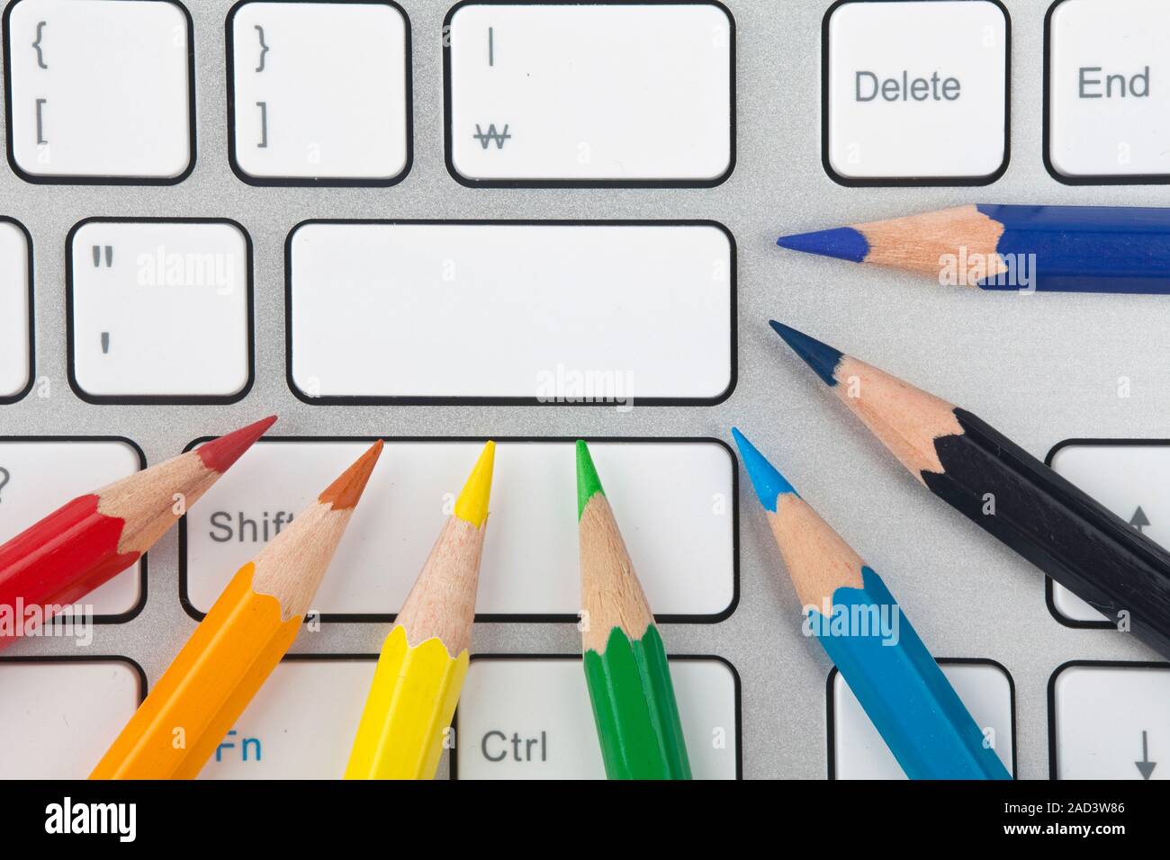 Color pencils assemble to enter key on keypad blank Stock Photo - Alamy