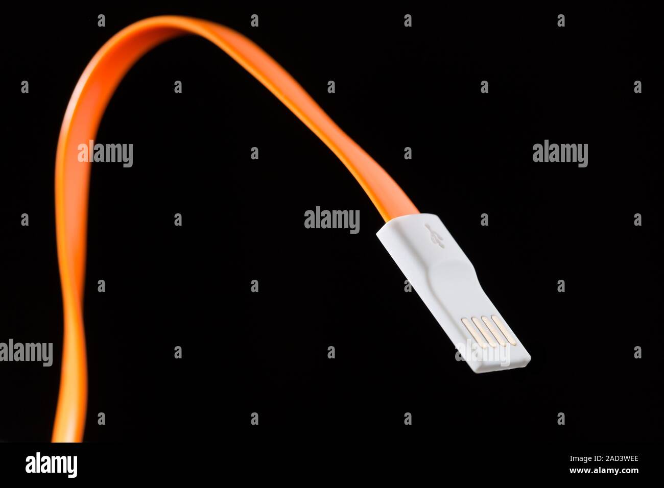 Orange cord on isolated background Stock Photo - Alamy