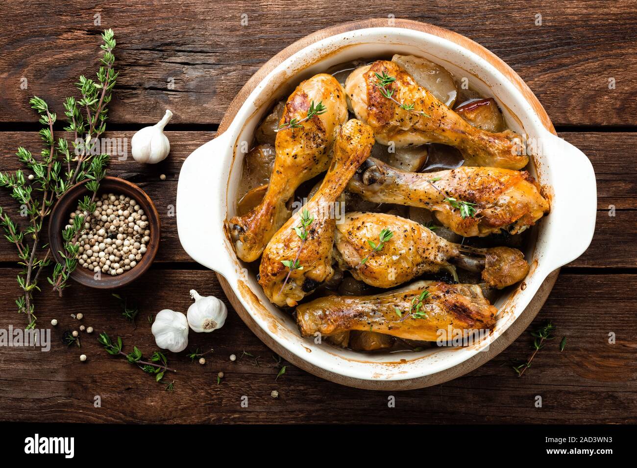 Roasted chicken legs on rustic wooden background, top view Stock Photo ...