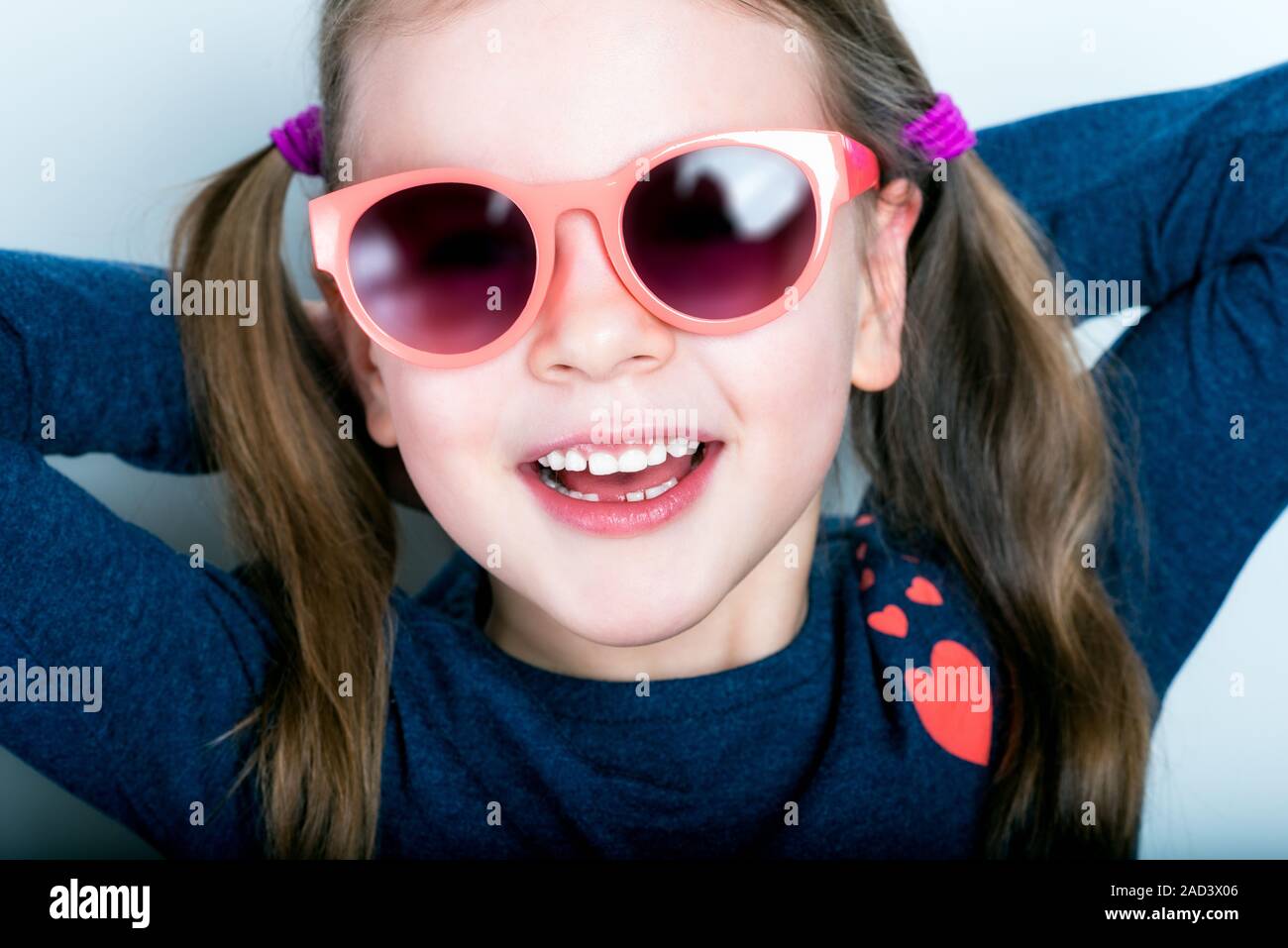 Toddler girl smiling happy sweet face teeth hi-res stock photography ...