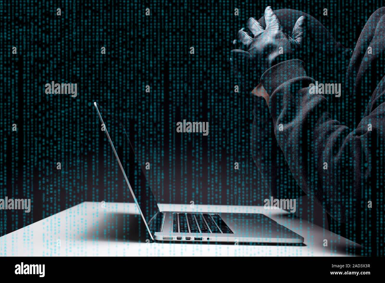 Robber hacks computer at night Stock Photo - Alamy