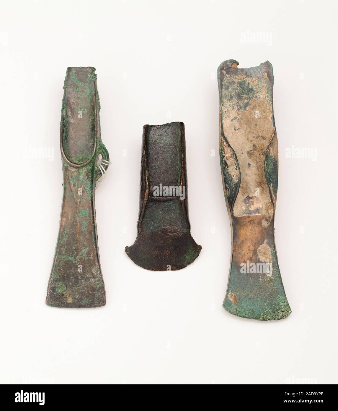 European Bronze Age axe heads. Three palstave axes of different form ...