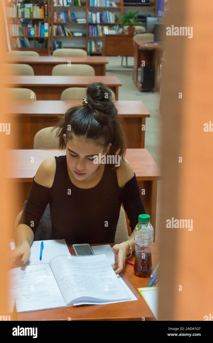 Sibiu, Romania - October 2019: Beautiful student girl learning in a ...