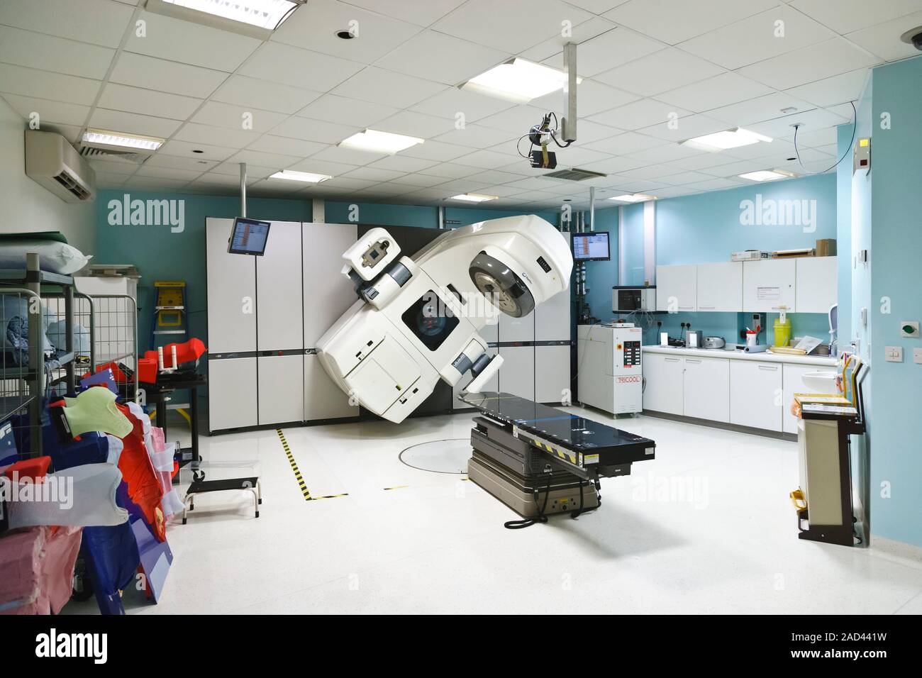 Radiotherapy linear accelerator. The machine at centre is a linear ...