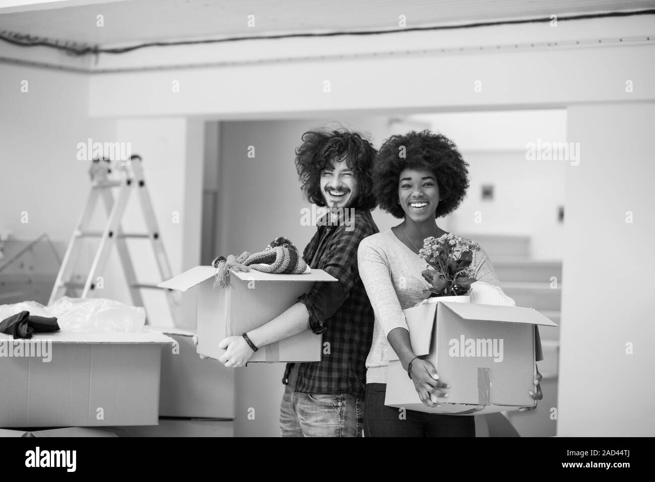 Moving in new apartment Black and White Stock Photos & Images - Alamy