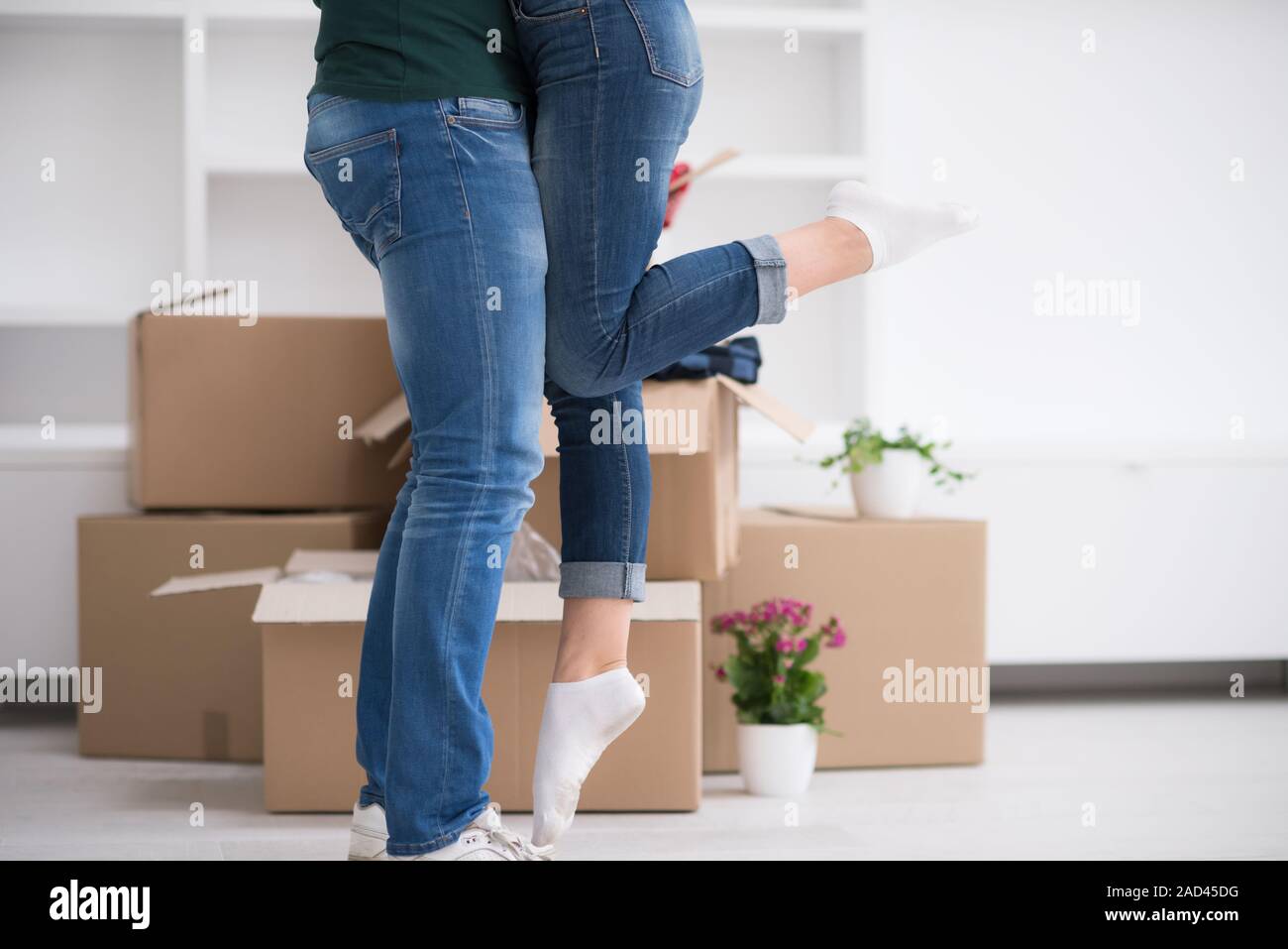 happy Young couple moving in new house Stock Photo - Alamy