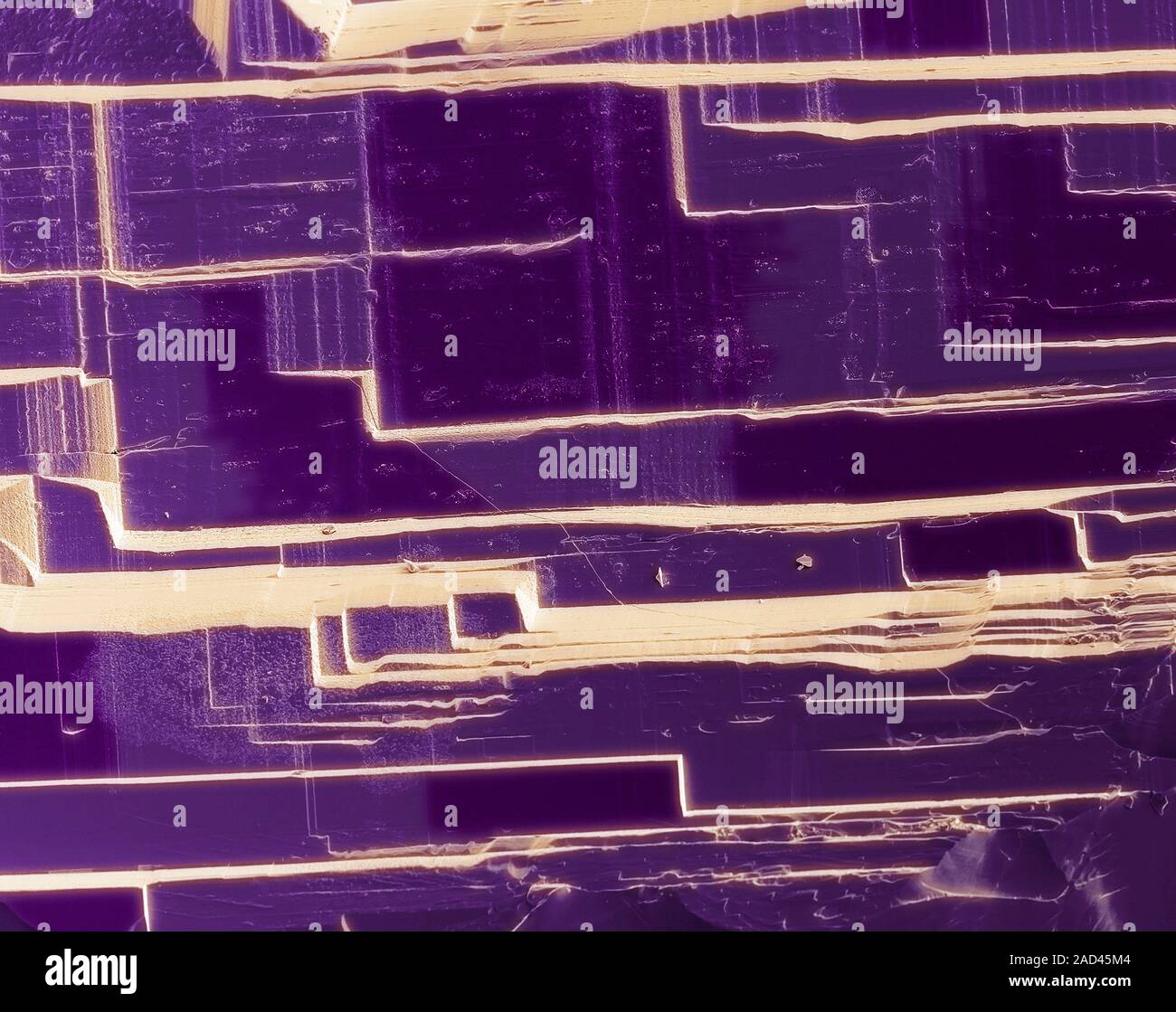Coloured scanning electron micrograph (SEM) of fractured amethyst ...