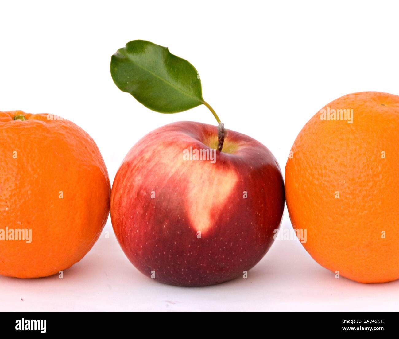 Apple and orange isolated on white background Stock Photo - Alamy