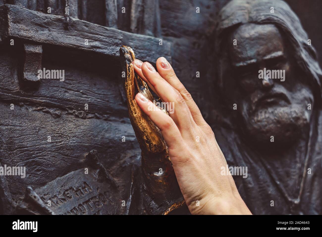 bronze hand of the monument is polished to a Shine for good luck ...