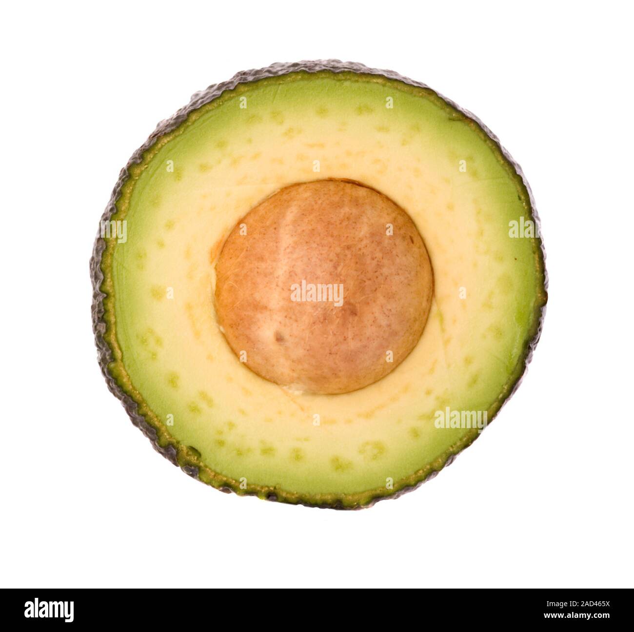 Section of avokado looking like cross-section of Earth Stock Photo - Alamy