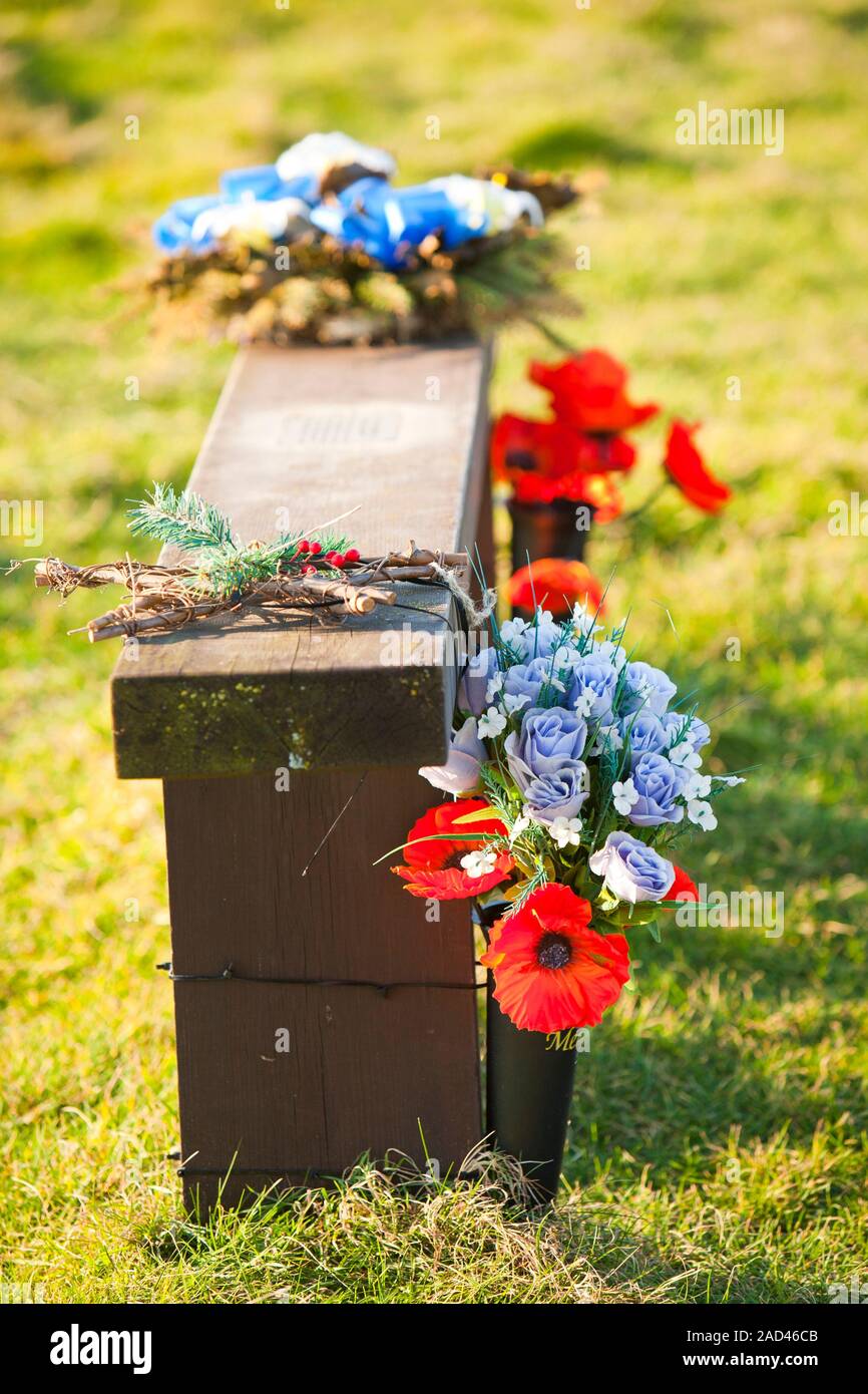 Flowers on a memorial bench near Souter, between Newcastle and ...