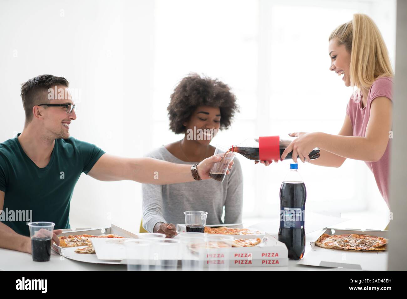 multiethnic group of young people have a lunch break Stock Photo - Alamy